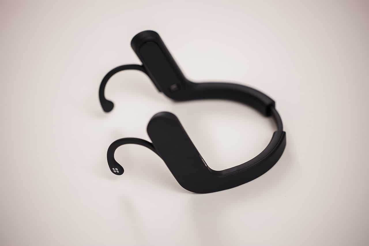 Cove neckband applies gentle vibrations behind the ears to reduce stress